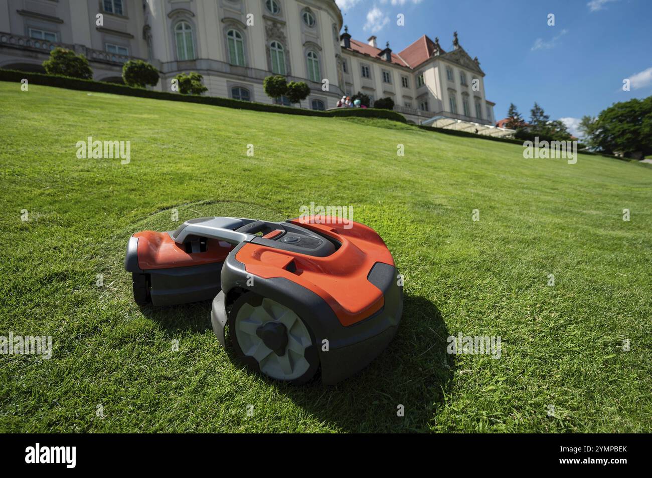Mower mows green overgrown grass hi-res stock photography and images ...