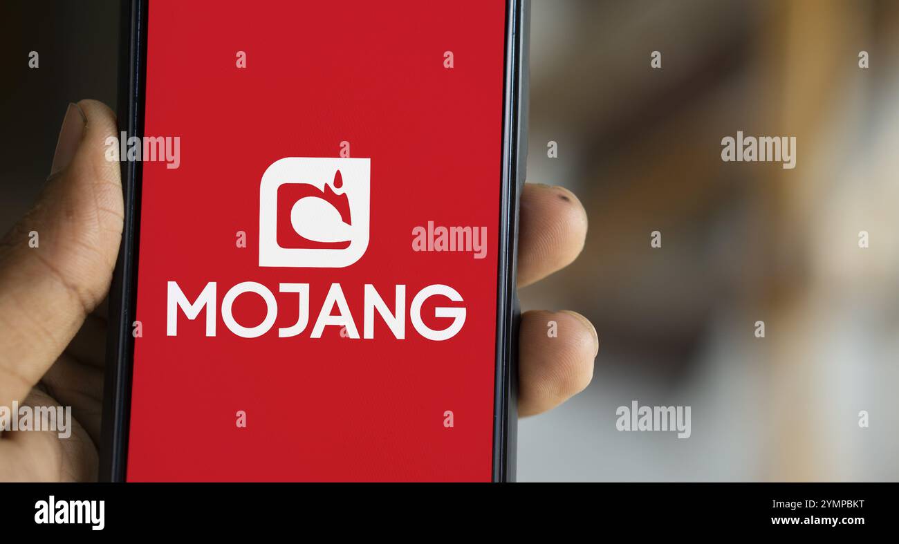 Mojang logo is displayed on smartphone. Mojang Studios is a Swedish ...