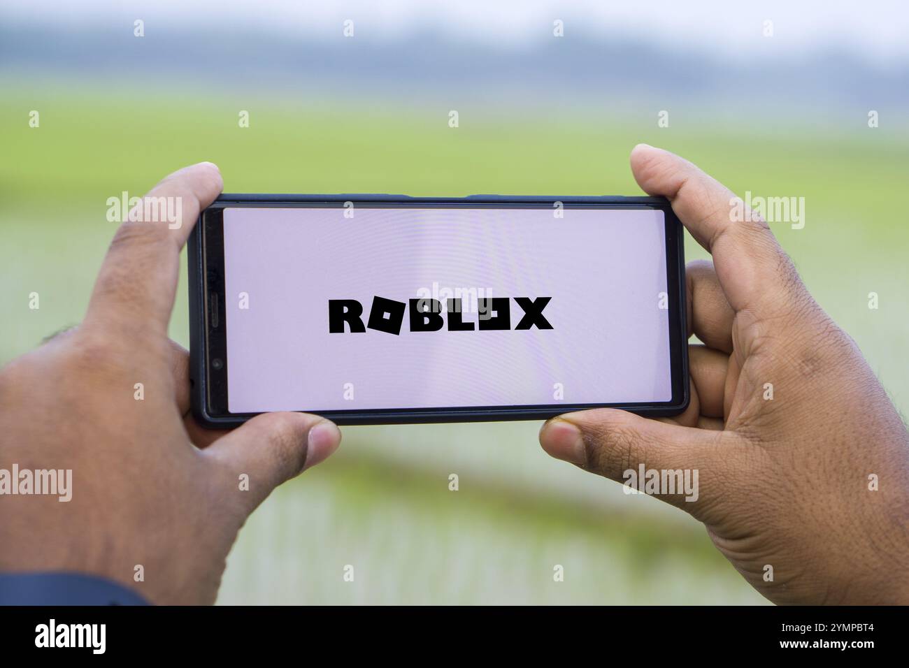 Roblox logo on smartphone Stock Photo - Alamy