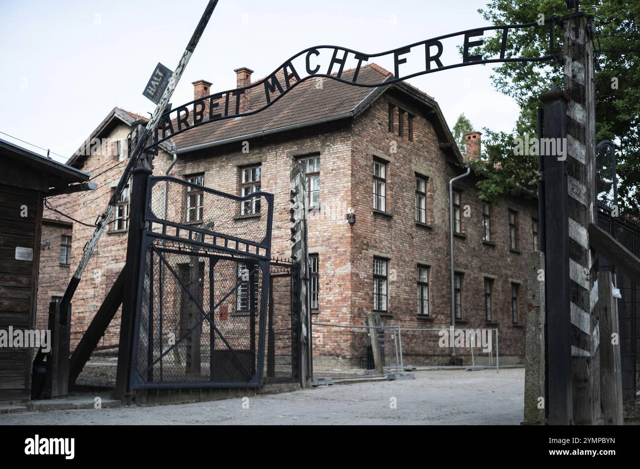 The main gate to the concentration camp Auschwitz Birkenau with an ...