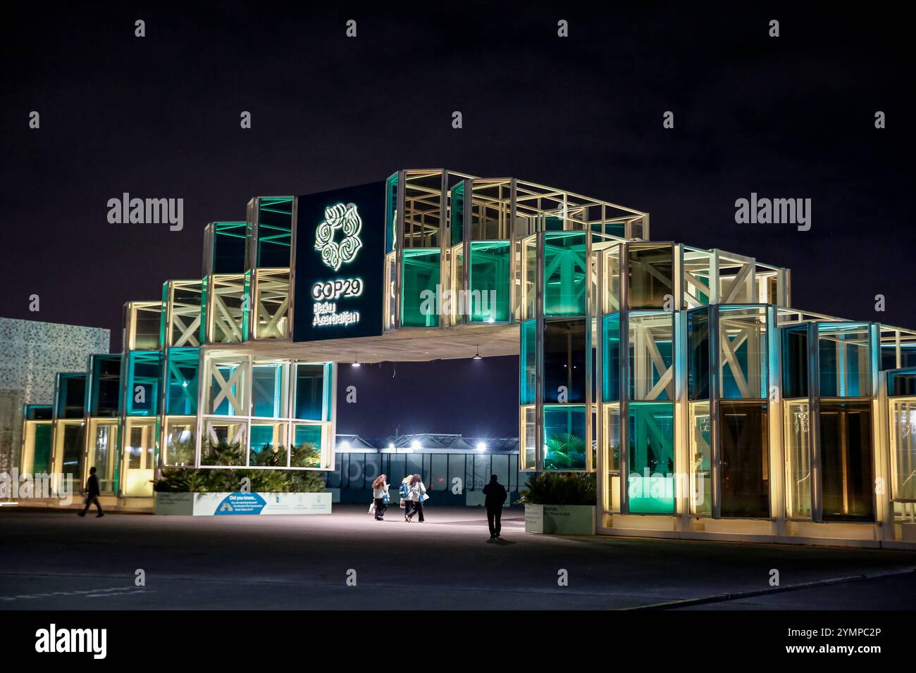 Baku, Azerbaijan. 21st Nov, 2024. Participants walk by a main entrance ...
