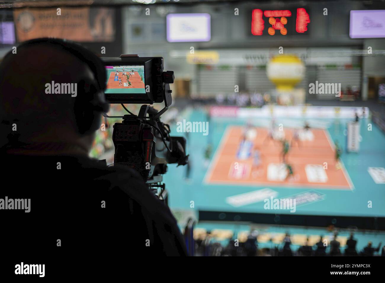 Professional TV camera in sports hall during volleyball match Stock ...