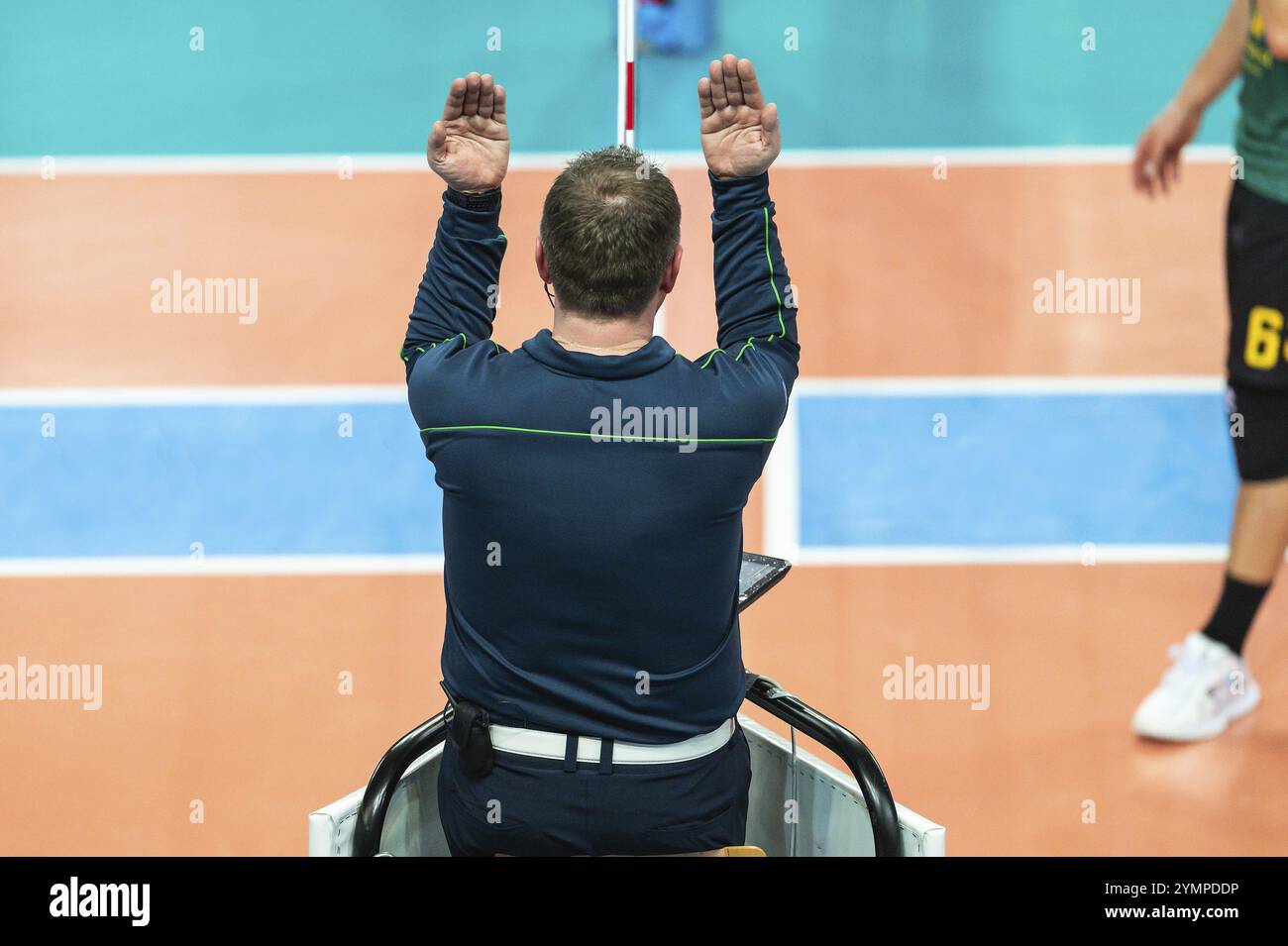 The referee gives a sign with his hand during a volleyball match Stock ...