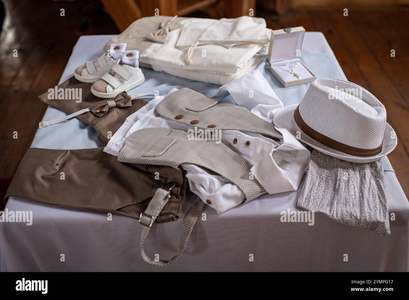 baptism clothes in a church Stock Photo - Alamy