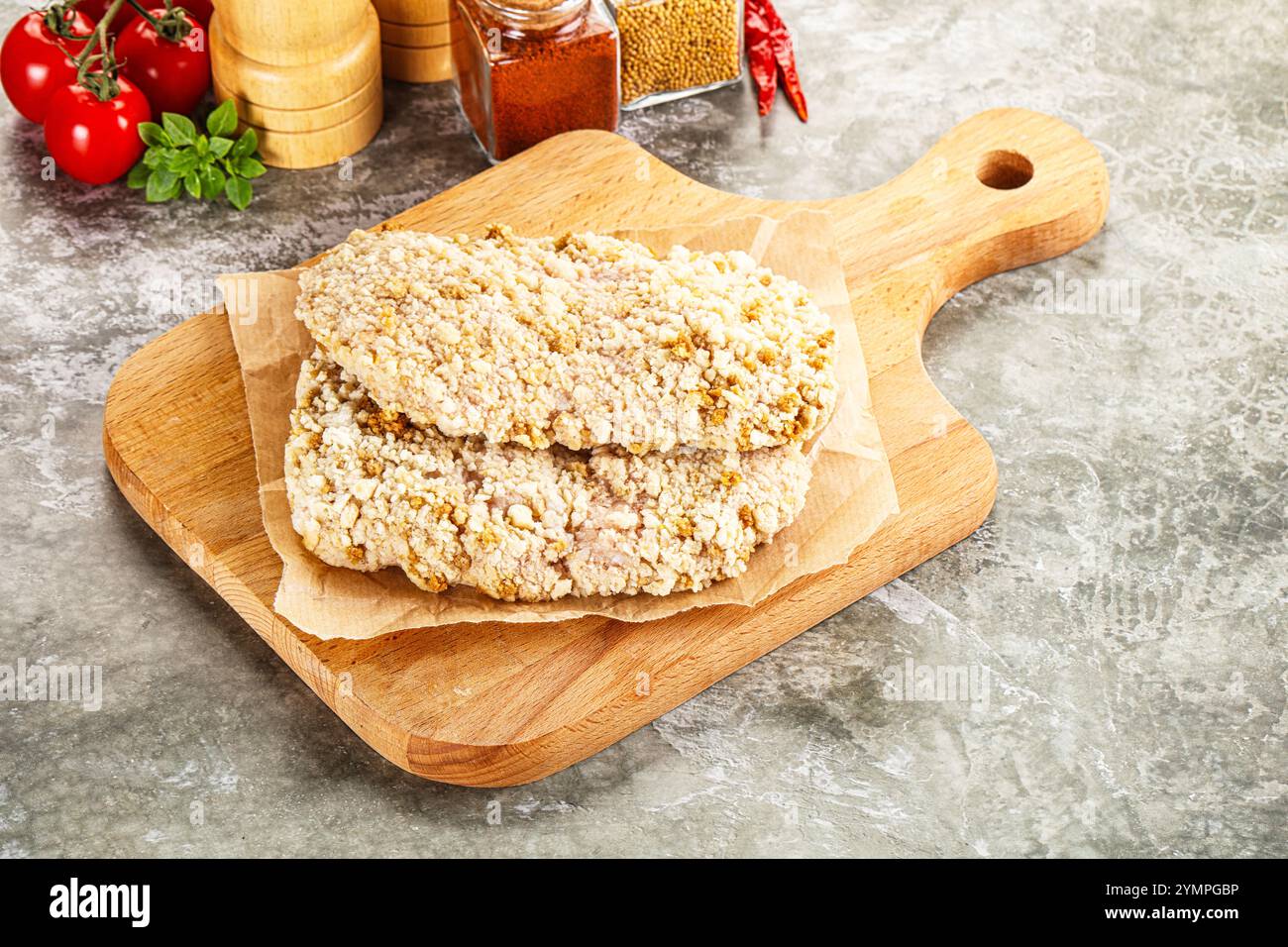Viennese breaded raw schnitzel hi-res stock photography and images - Alamy