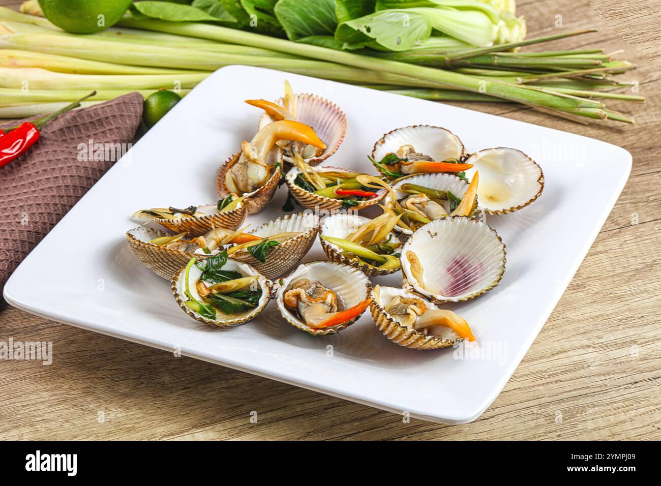 Delicous Asian mollusk shell steamed with spices Stock Photo - Alamy