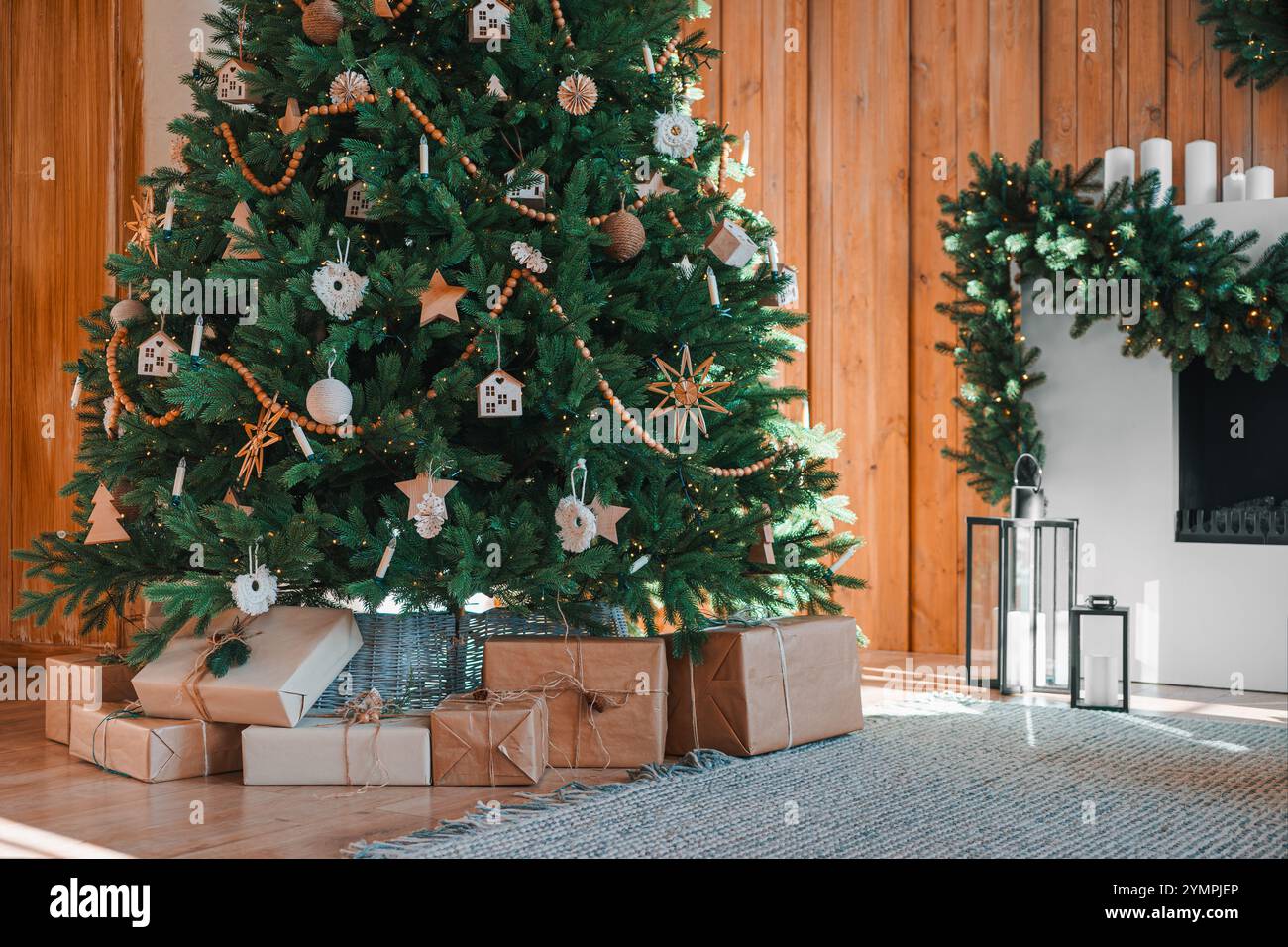 Beautifully adorned christmas tree stands hi-res stock photography and ...