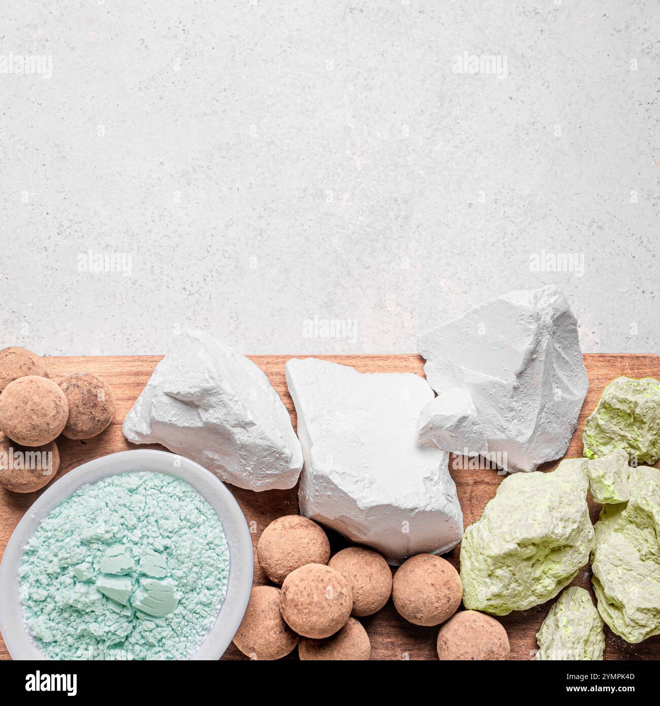 Edible various Clay Stones, clay rocks and powder on white background ...