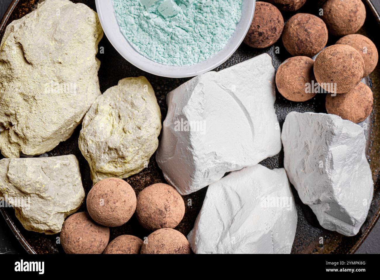 Edible various Clay Stones, clay rocks and powder close up. Assorted ...