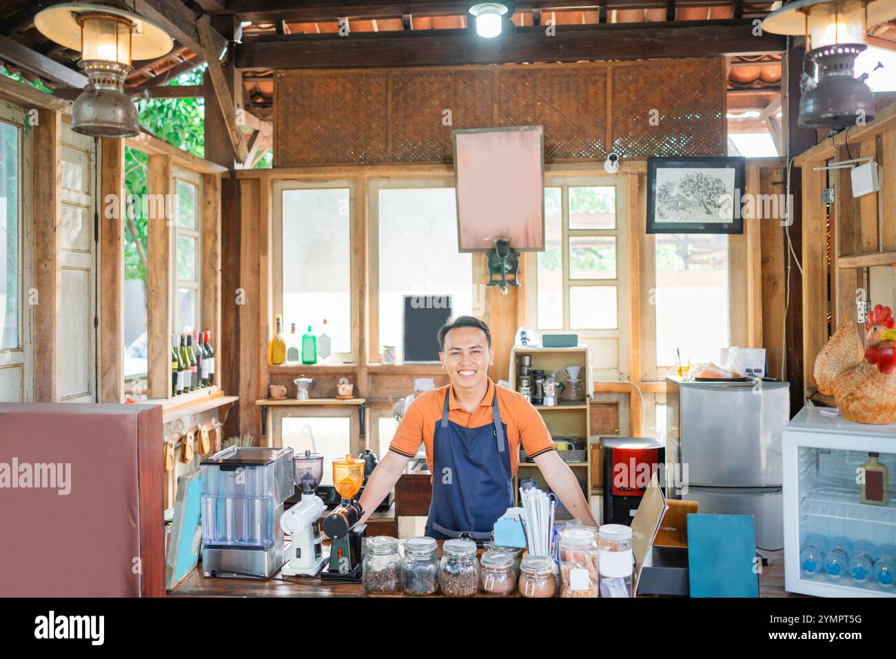 professional coffee shop male barista standing Stock Photo - Alamy