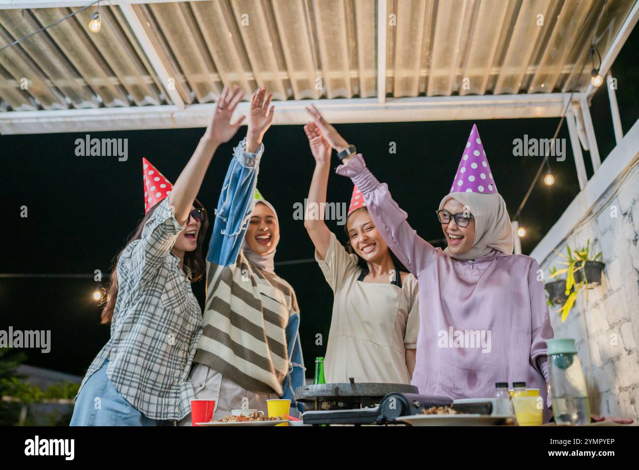 Joyous women celebrating friendship hi-res stock photography and images ...