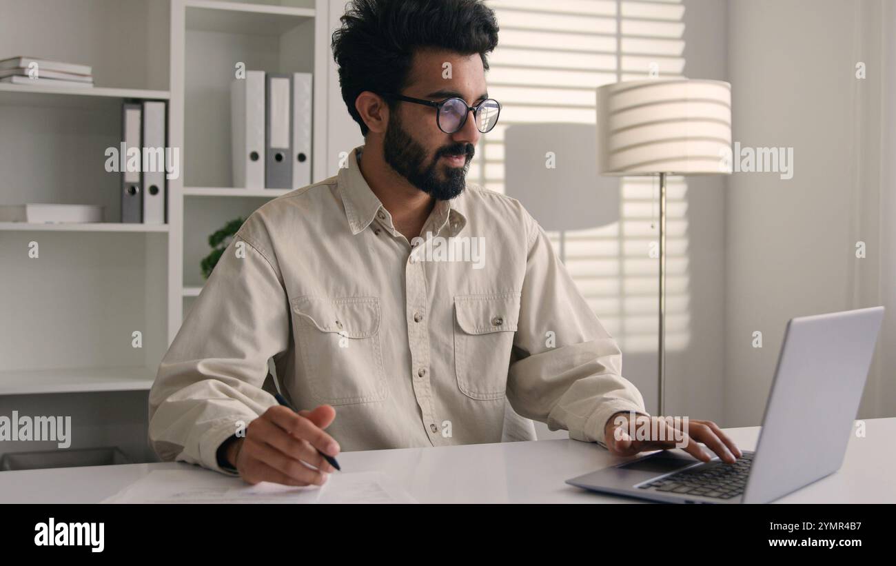 Focused man Arabian Indian ethnic businessman male employee manager ...