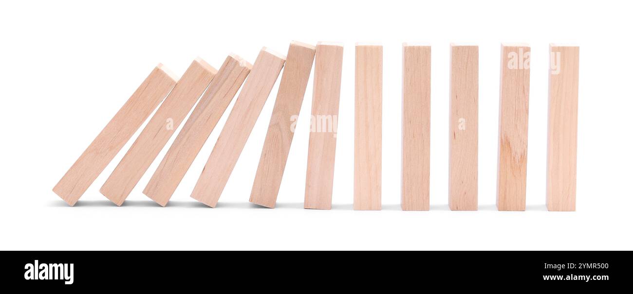 Domino effect. Wooden blocks falling on white background Stock Photo ...