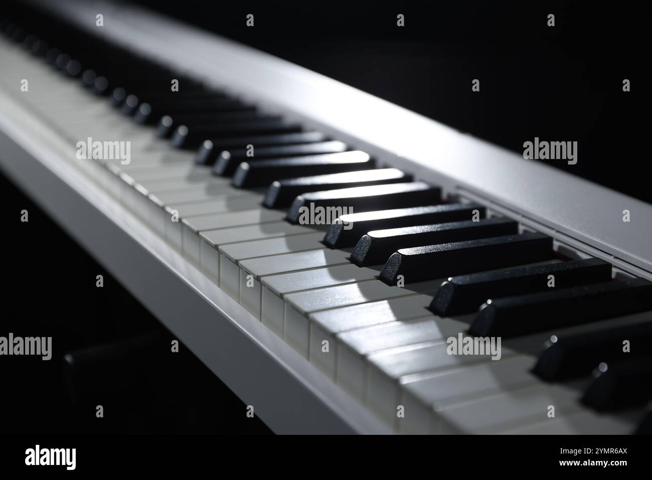 Synthesizer on black background, closeup. Electronic musical instrument ...