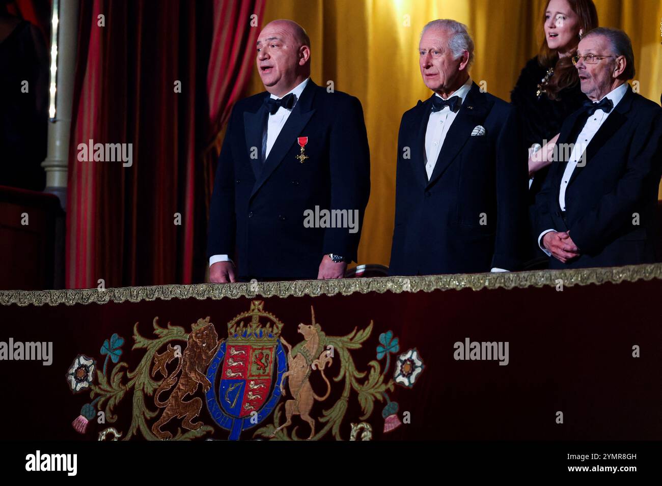 The national anthem is played as King Charles III and Giles Cooper ...