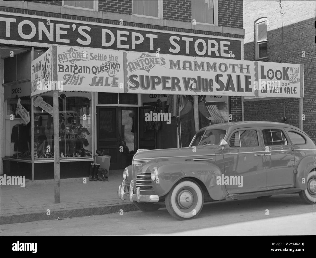 Signs on store windows advertising sales, Zebulon Wake County, North ...