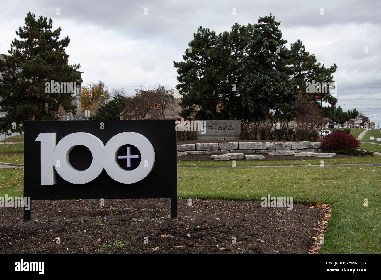 Welcome to the city of Oshawa and 100 years signs on King Street West ...