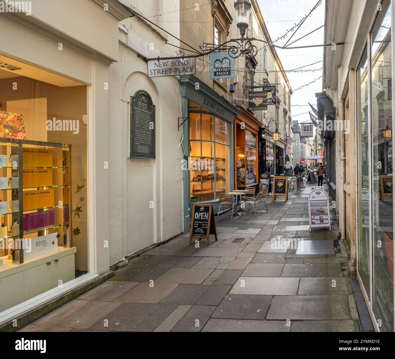 Shops and cafes along pedestrian alleyway in Northumberland Place, Bath ...