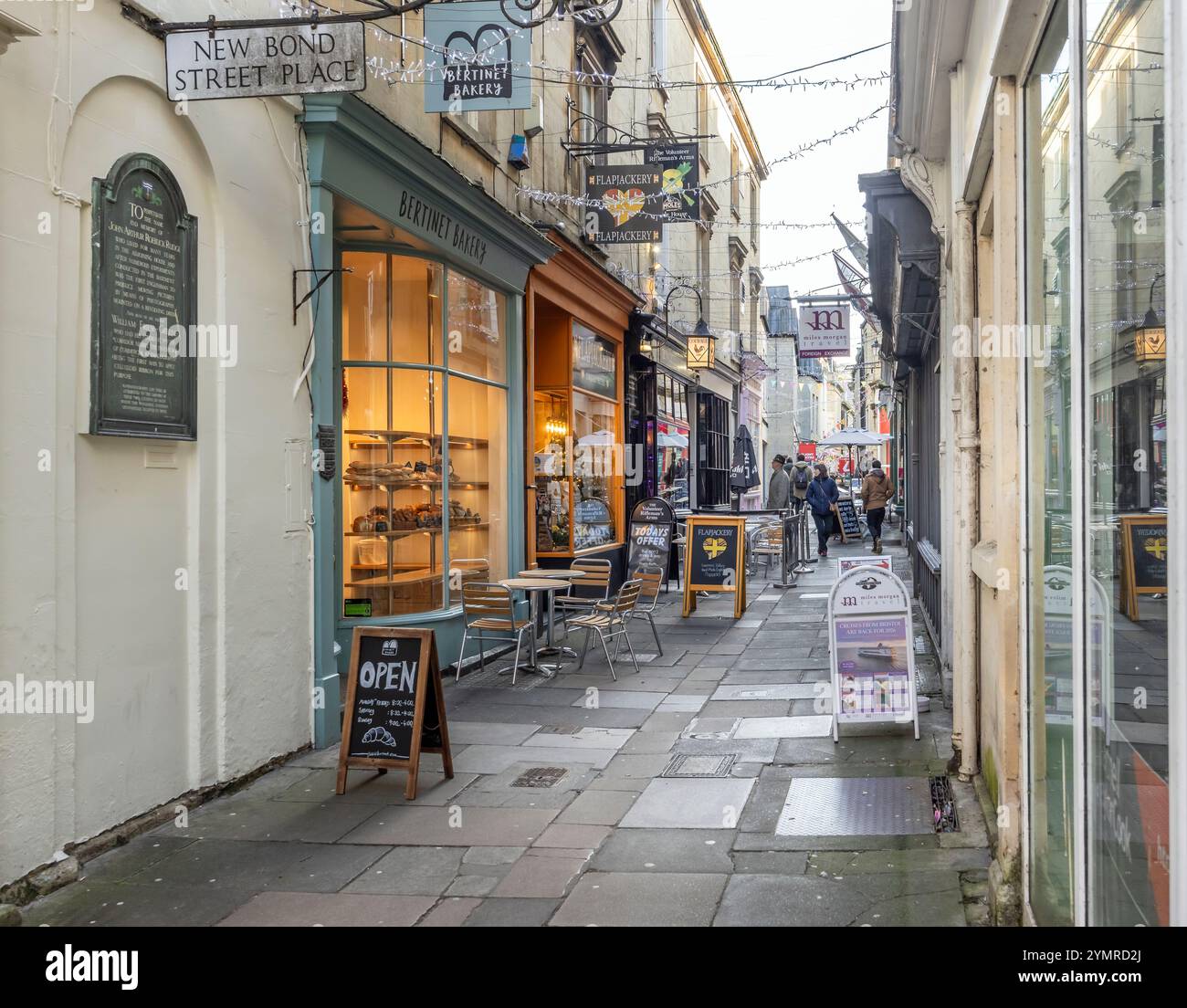 Shops and cafes along pedestrian alleyway in Northumberland Place, Bath ...