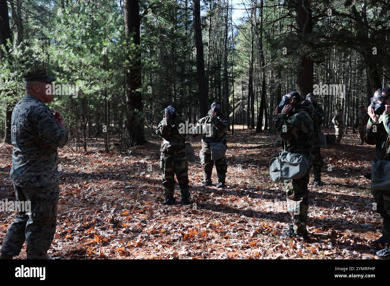 From left, U.S. Marine Staff Sgt. Fabian Herrera, CBRN chief with the ...