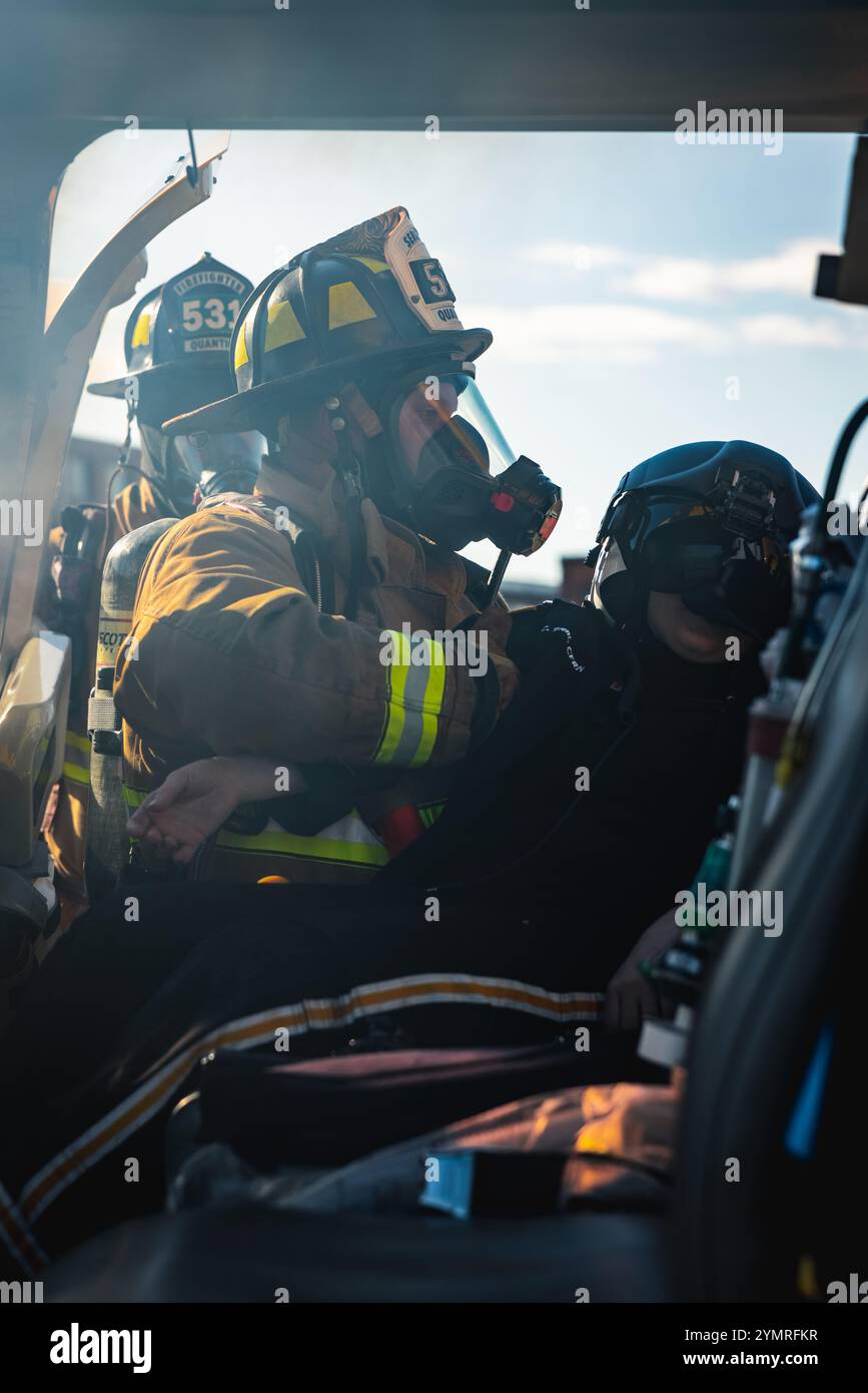 Firefighters with Quantico Fire and Emergency Services simulate ...