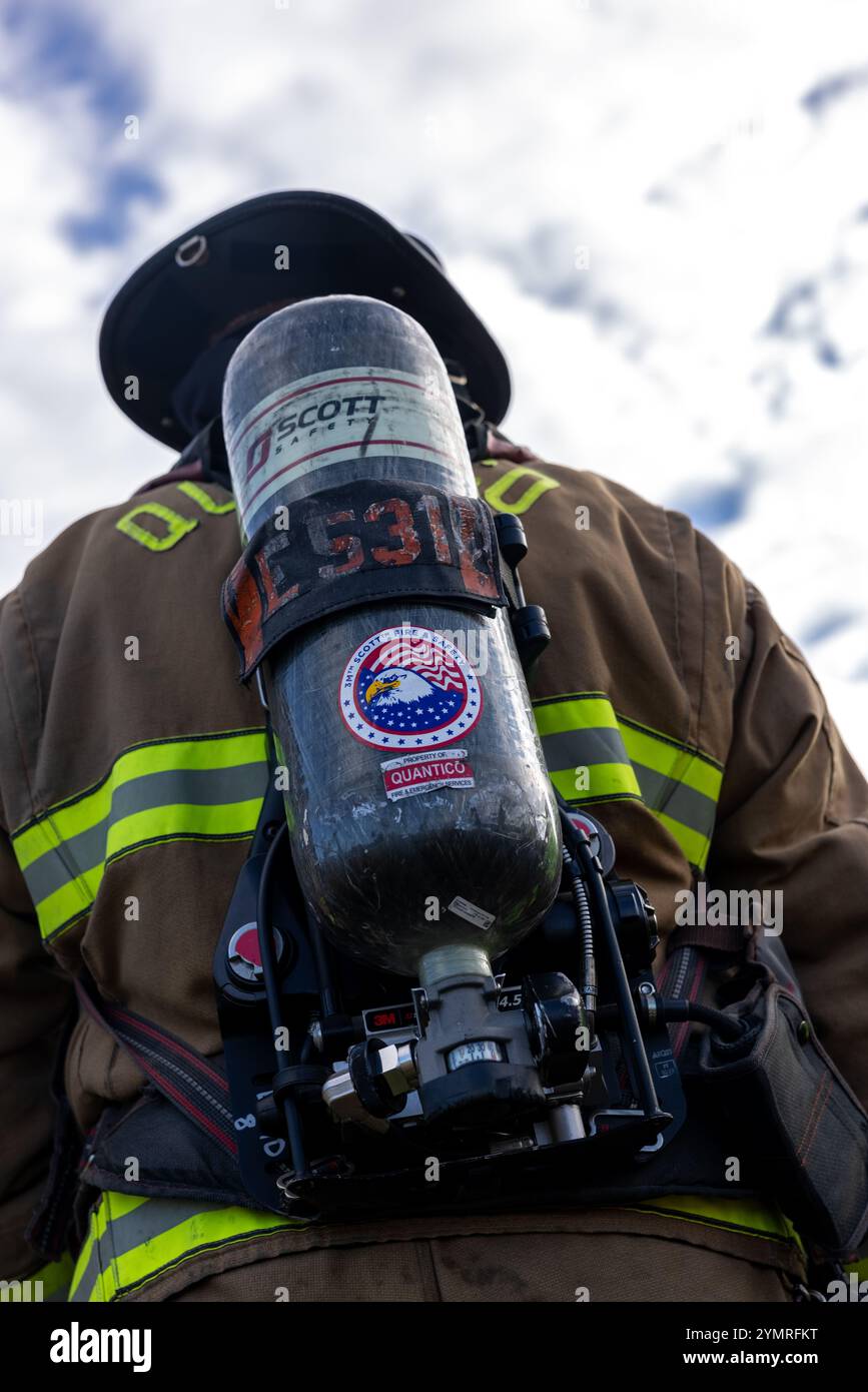 A firefighter with Quantico Fire and Emergency Services participates in ...