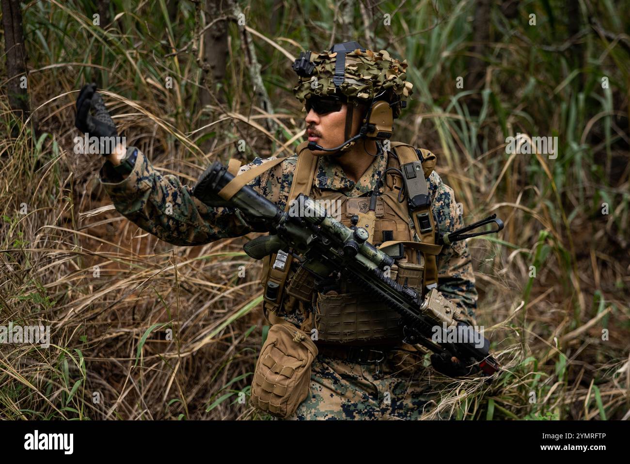 A U.S. Marine with 3d Littoral Combat Team, 3d Marine Littoral Regiment ...