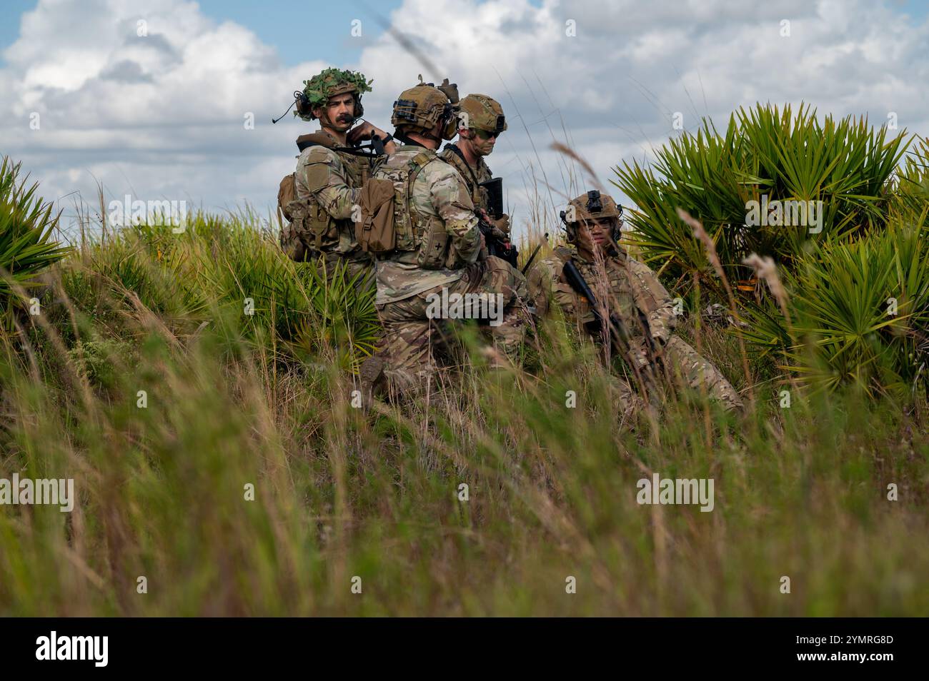 U.S. Air Force Airmen assigned to the 820th Base Defense Group discuss ...