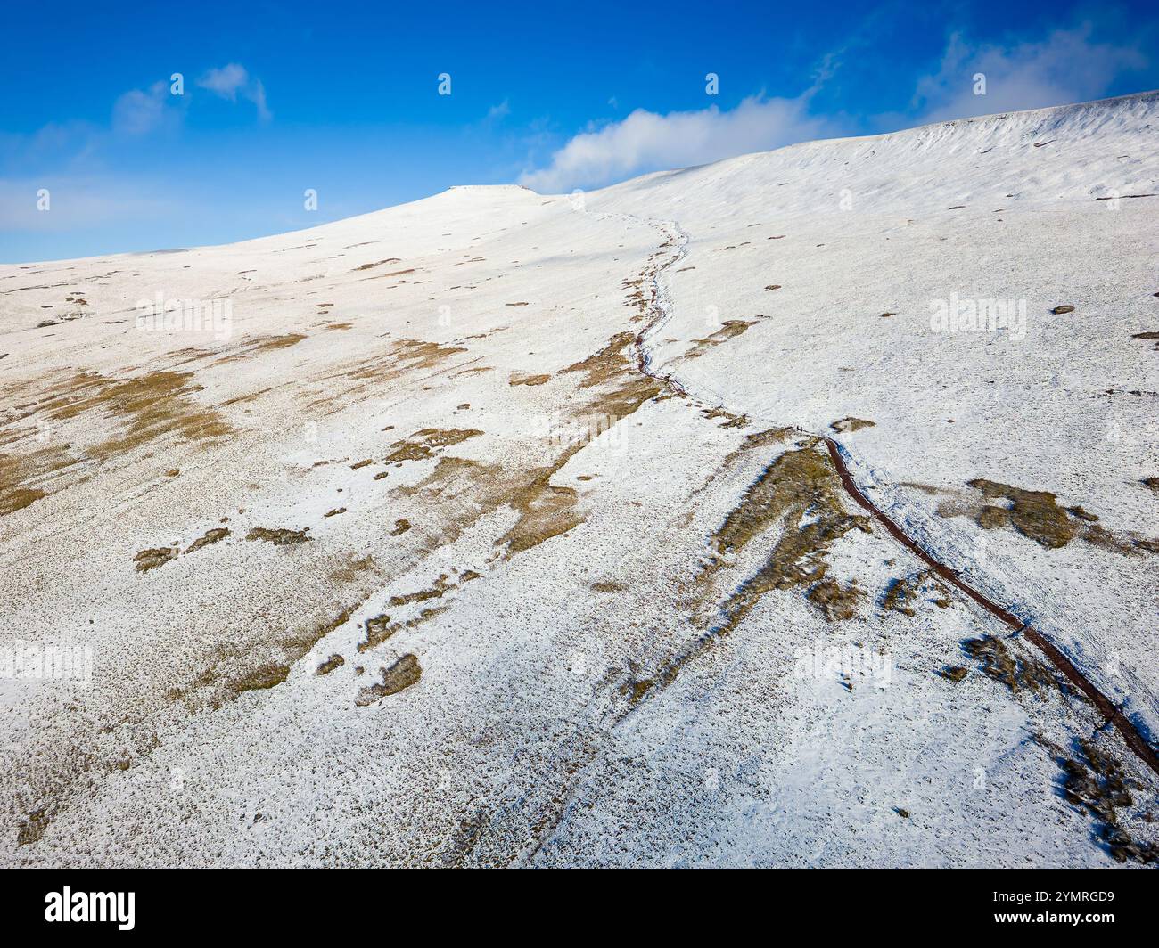 Aerial view of the snow covered path from Pont-ar-Daf to the summit of ...