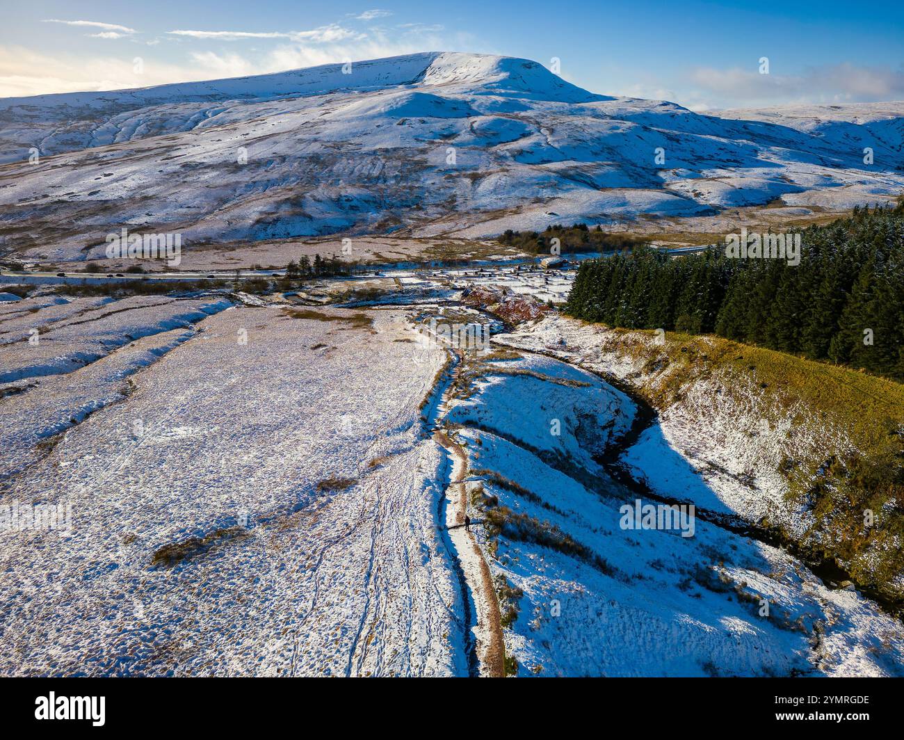 Aerial view of the snow covered path from Pont-ar-Daf to the summit of ...