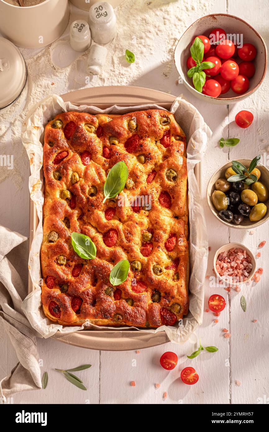 Tasty focaccia made of basil and cherry tomatoes. Poster for Restaurant ...