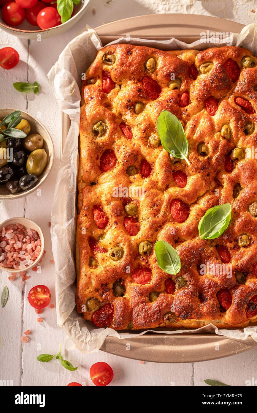 Traditional focaccia made of basil and cherry tomatoes. Poster for ...