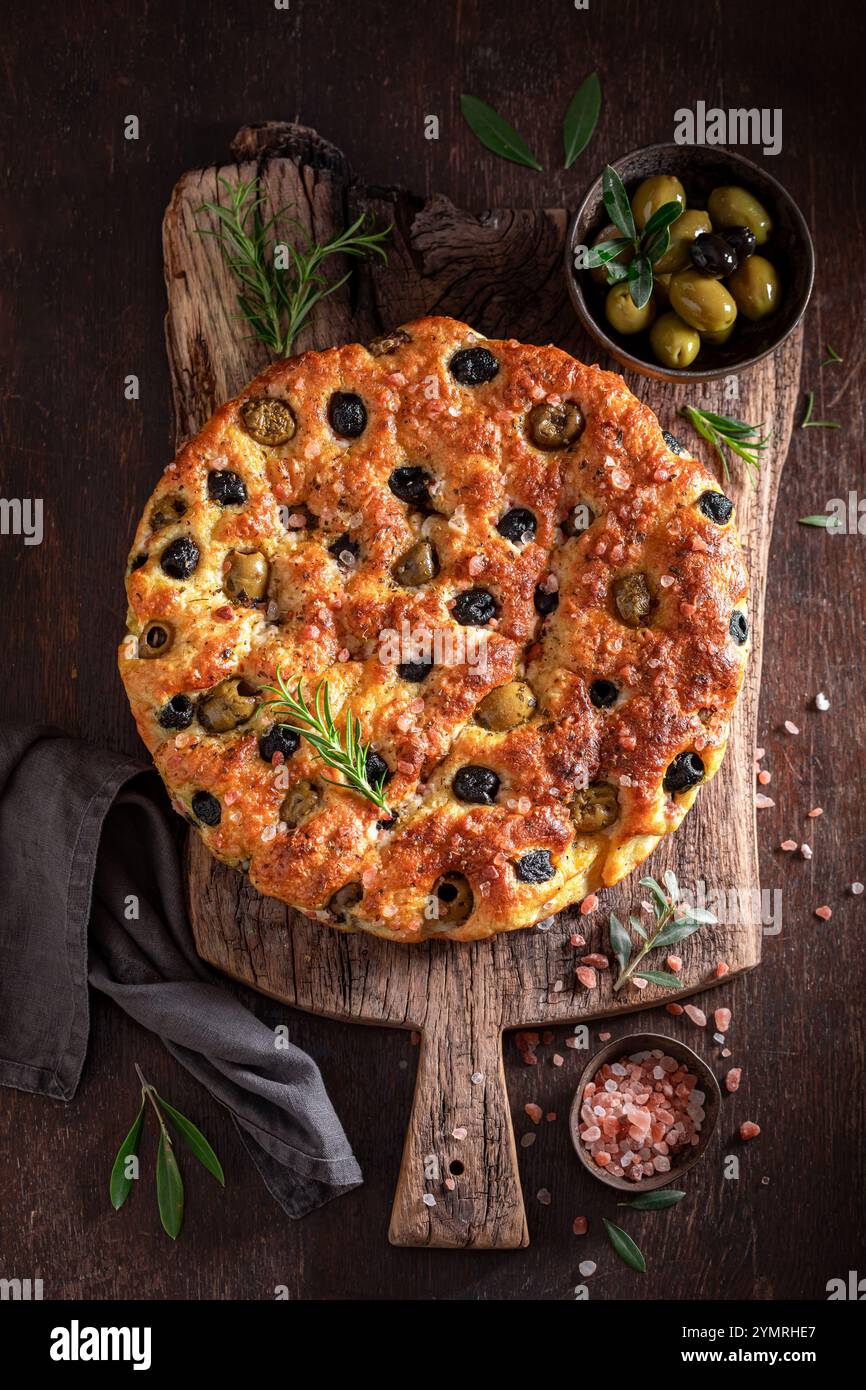 Hot focaccia baked in a round baking tin. Poster for Restaurant ...