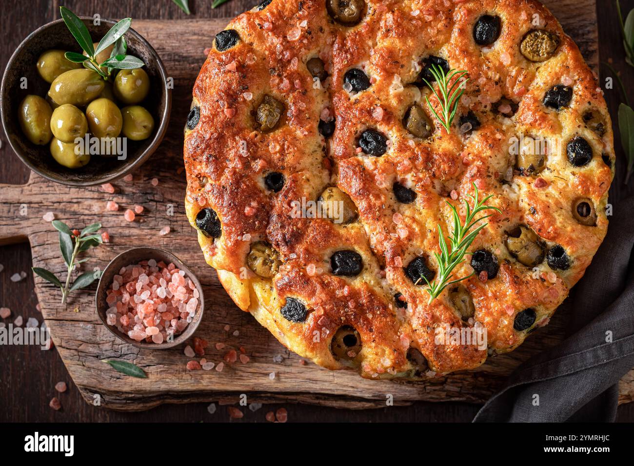Tasty focaccia with different types of olives. Traditional focaccia ...
