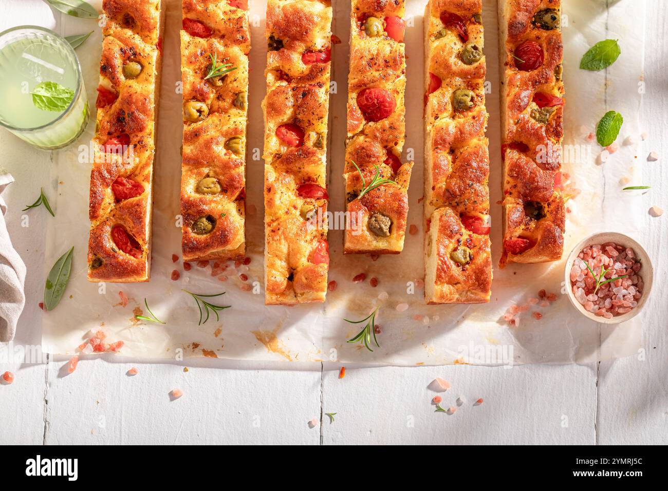 Tasty and homemade focaccia served with cold lemonade. Traditional ...