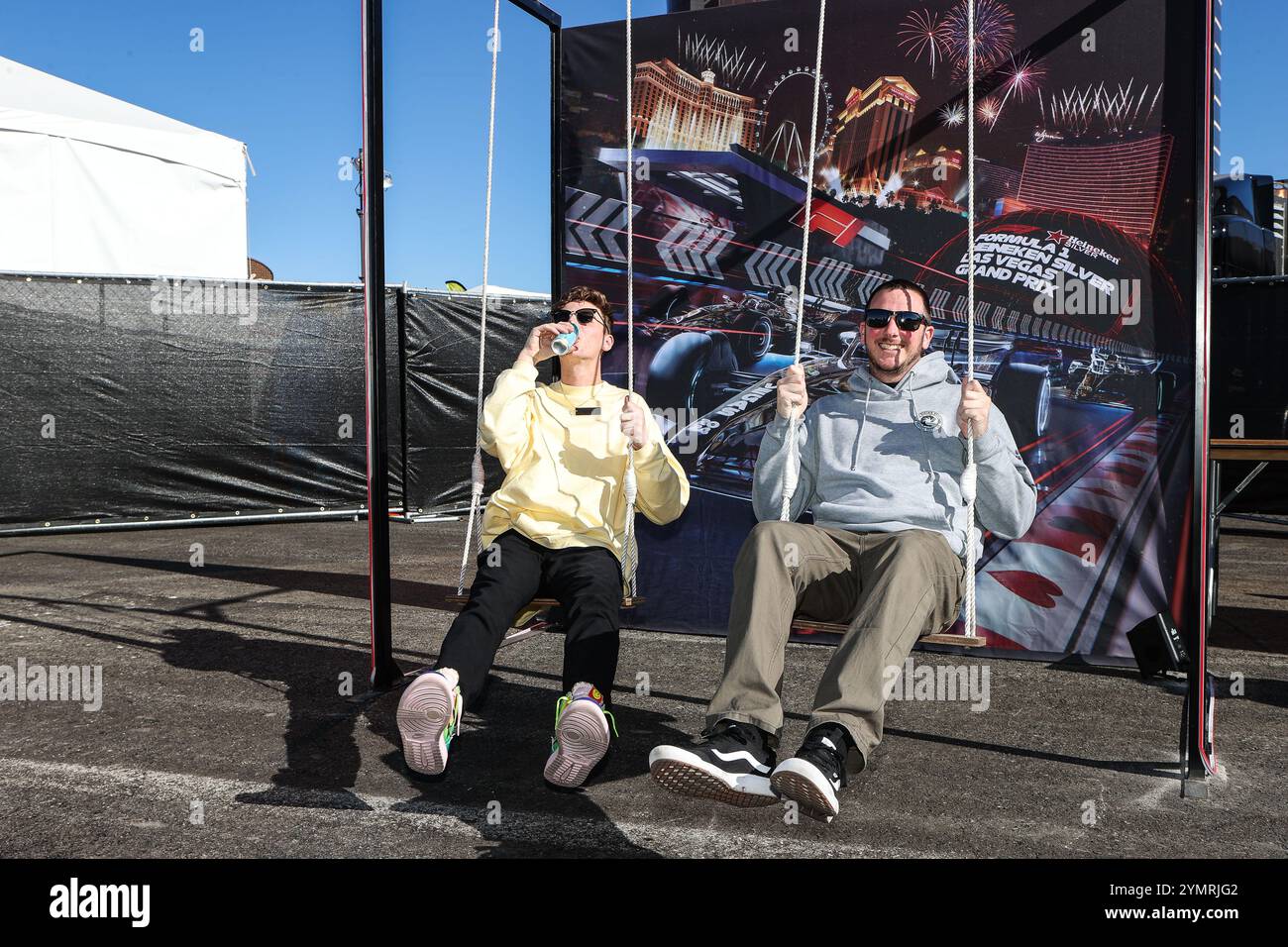 Las Vegas, NV, USA. 22nd Nov, 2024. Two fans take time for a quick ...