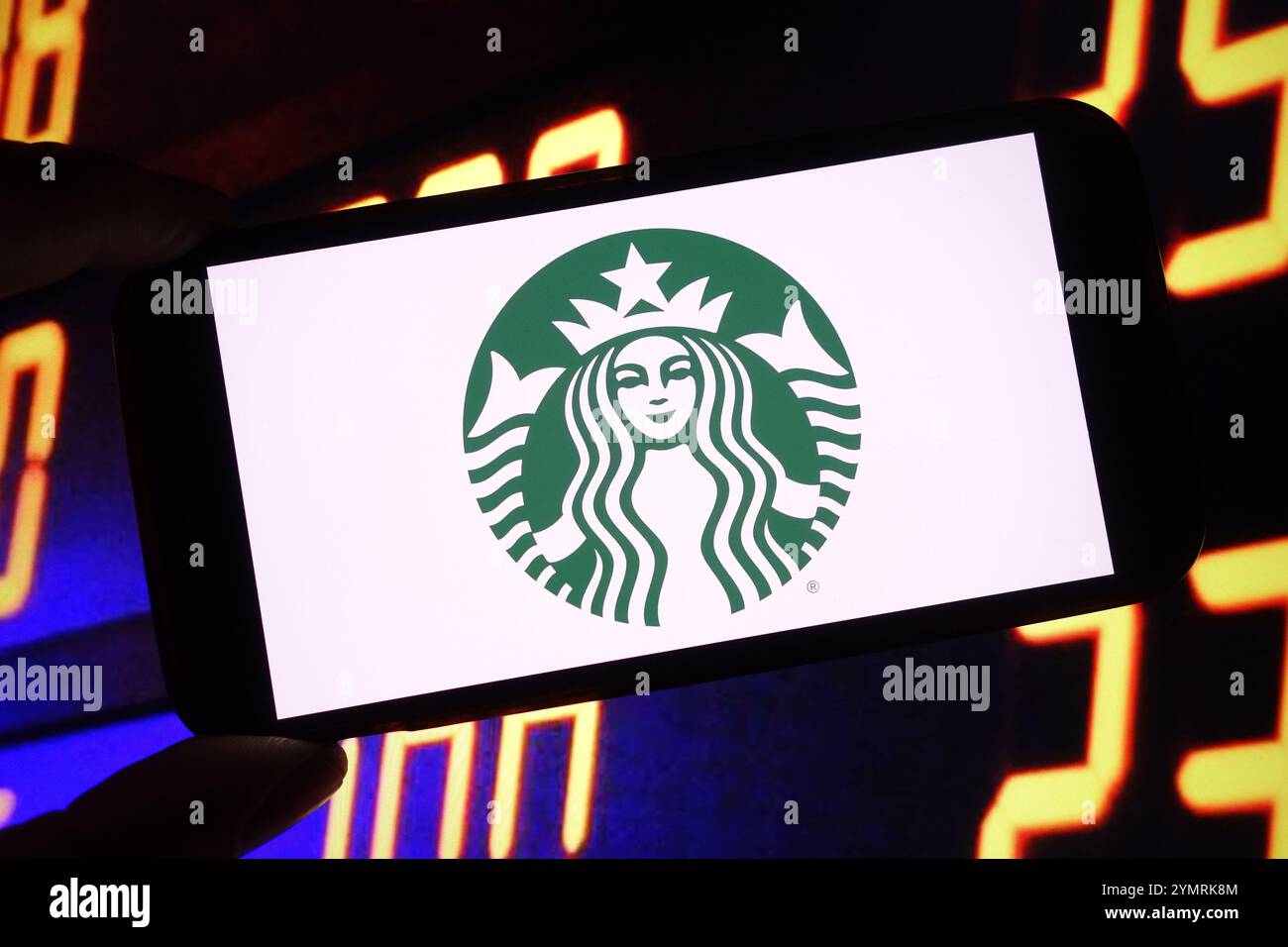 In this photo illustration, the Starbucks company logo is seen ...