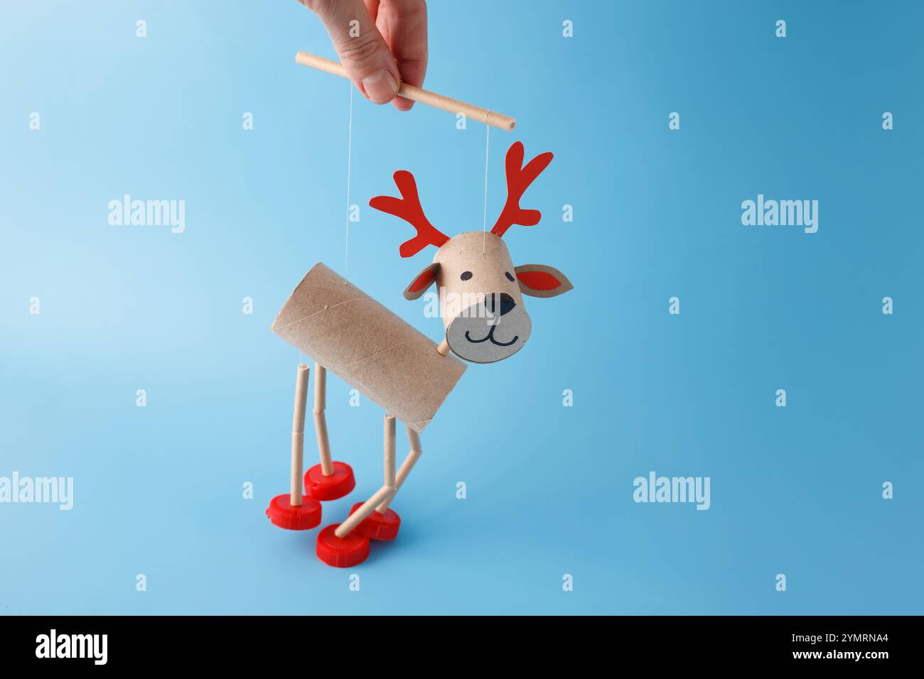 Child holding puppet string hi-res stock photography and images - Alamy