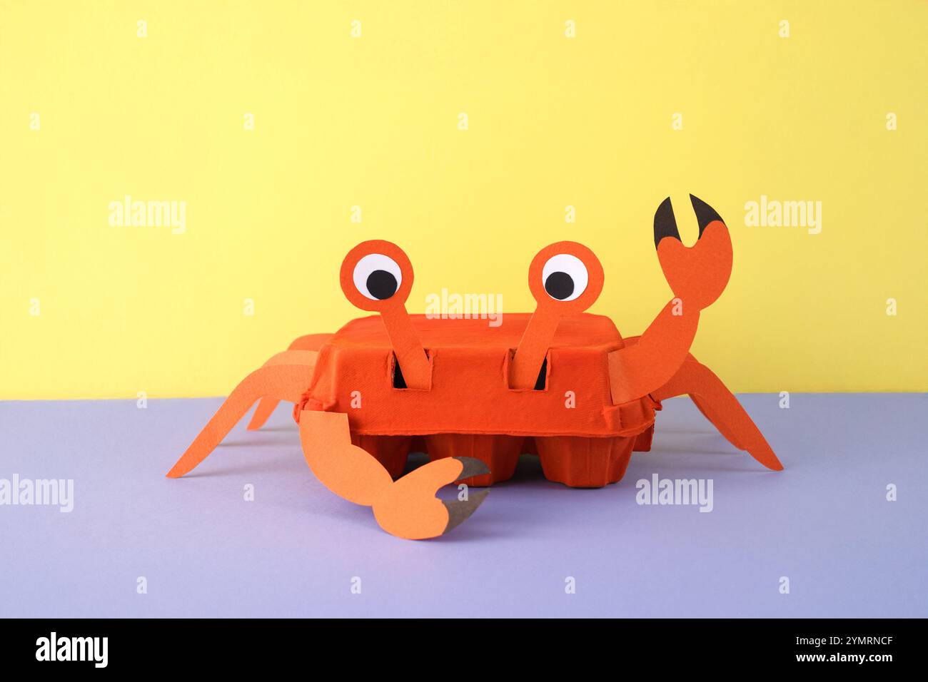 Recycled crab craft using red egg carton with paper details for legs ...