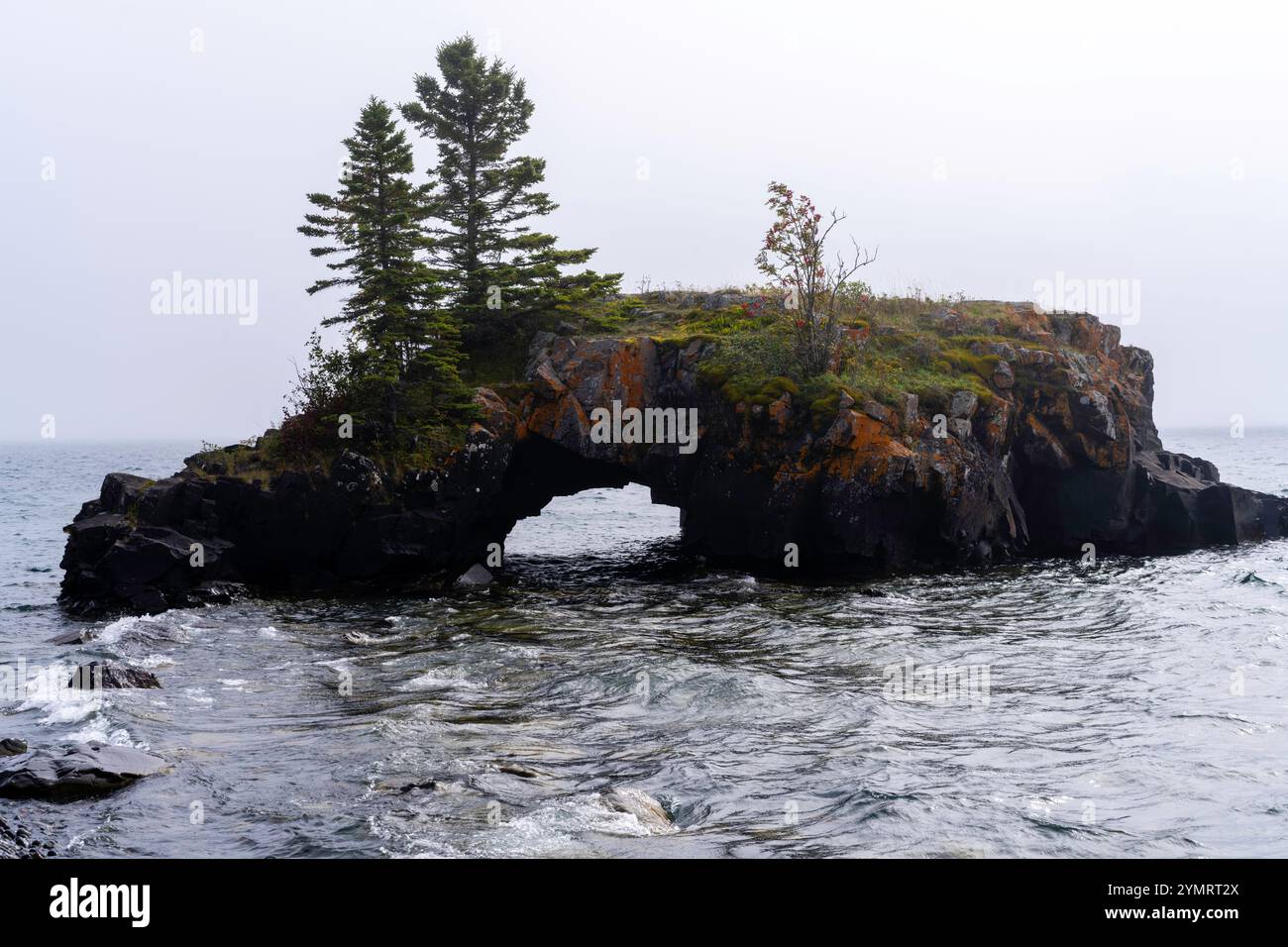 Hollow Rock in Lake Superior on an overcast day. Grand Portage ...