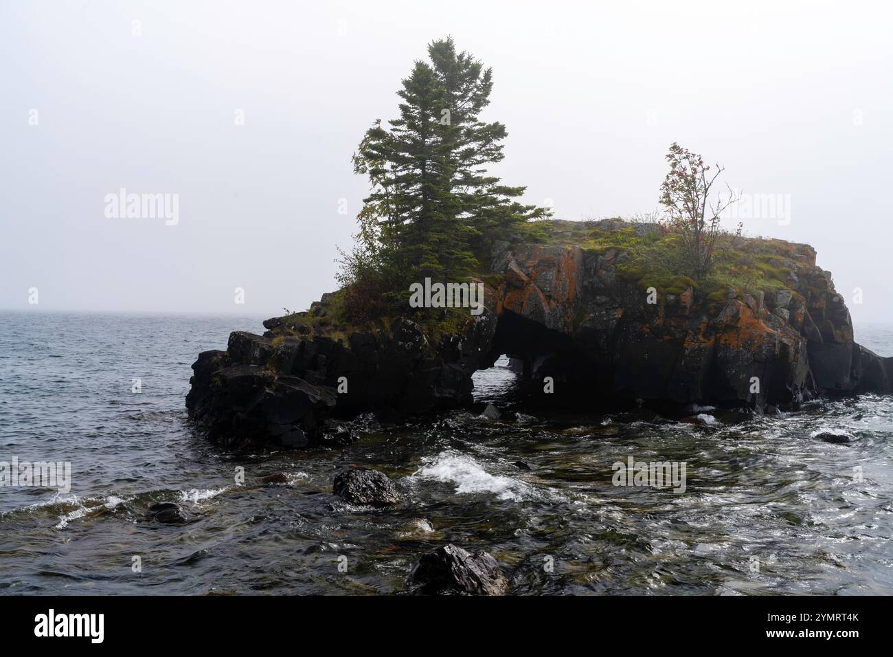 Hollow Rock in Lake Superior on an overcast day. Grand Portage ...