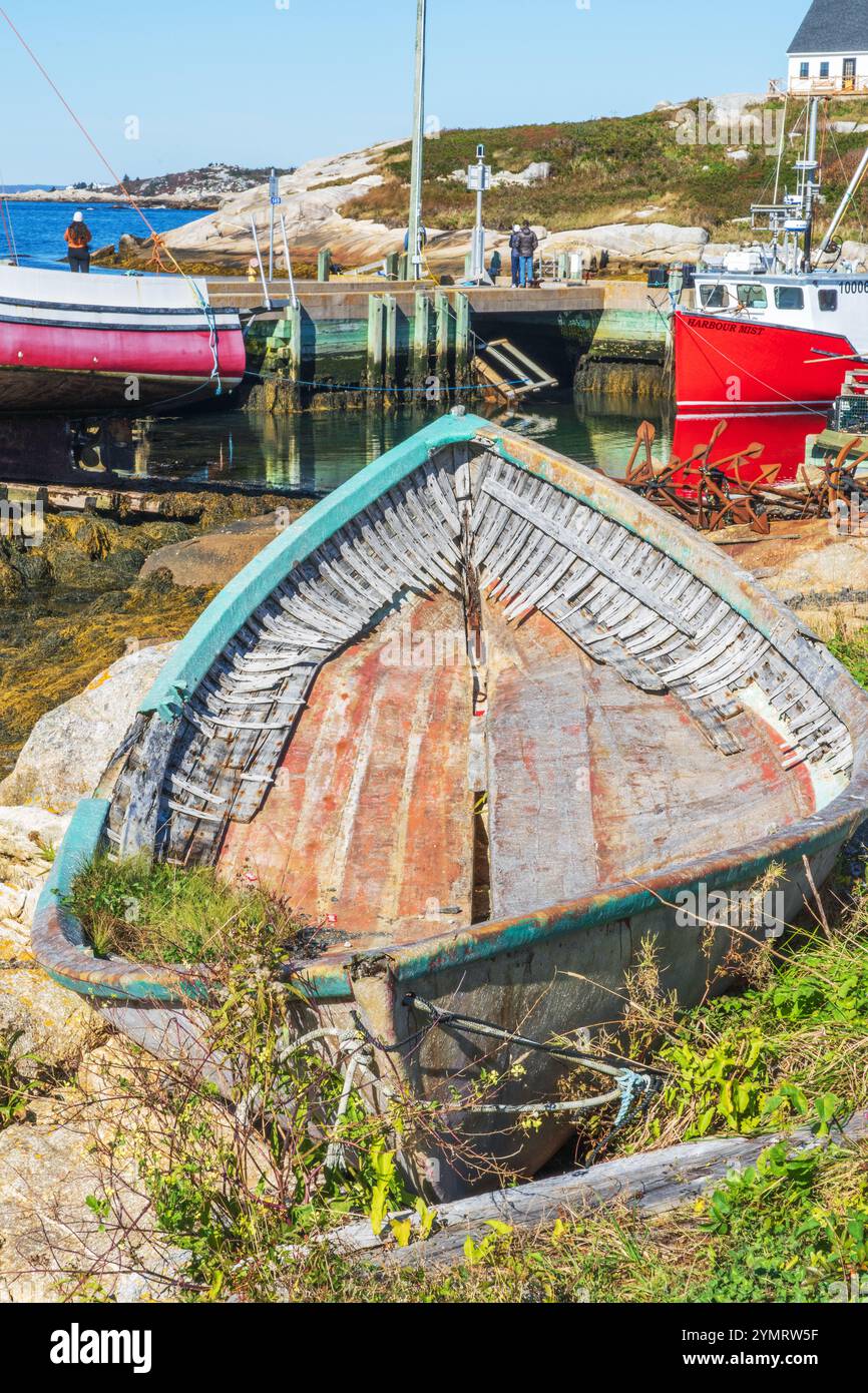 Old dory in a poor state rotting away on shore in Peggys Cove Nova ...