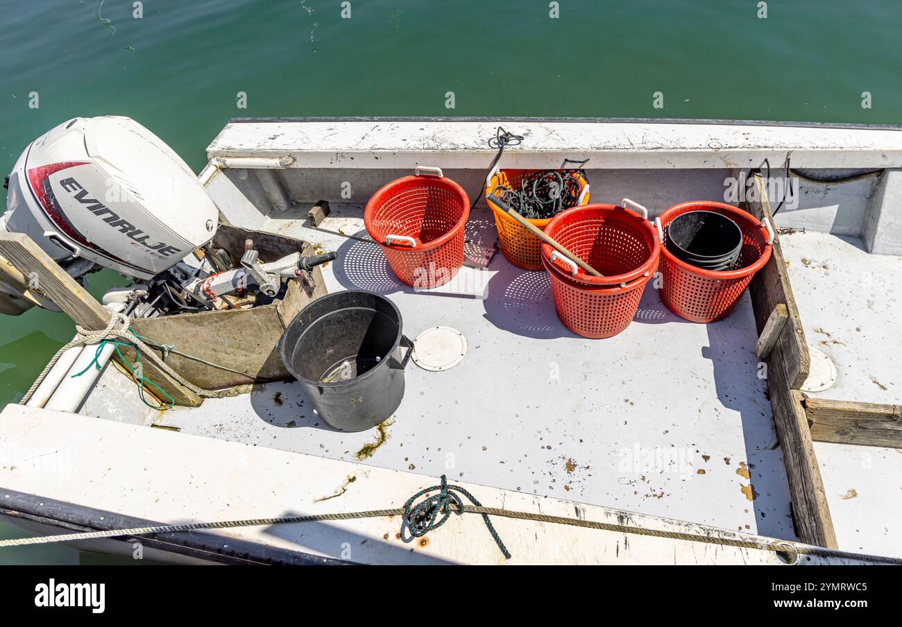 detail of of a small outboard boat with fishing equipment Stock Photo ...
