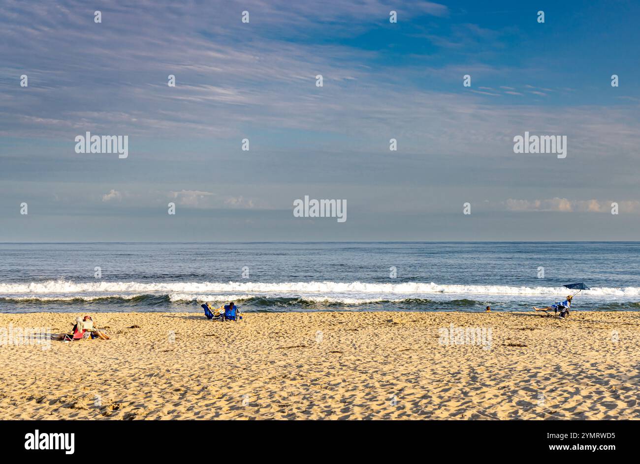 people enjoying a beach day at a wainscott beach Stock Photo - Alamy