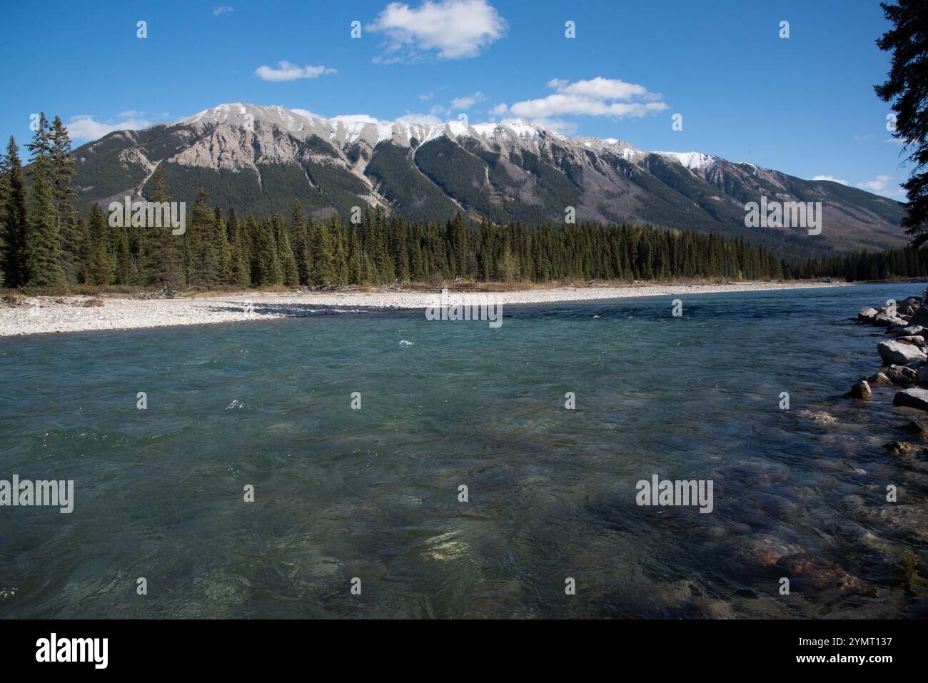Crystal clear water is running as Kootenay river in Kootenay National ...