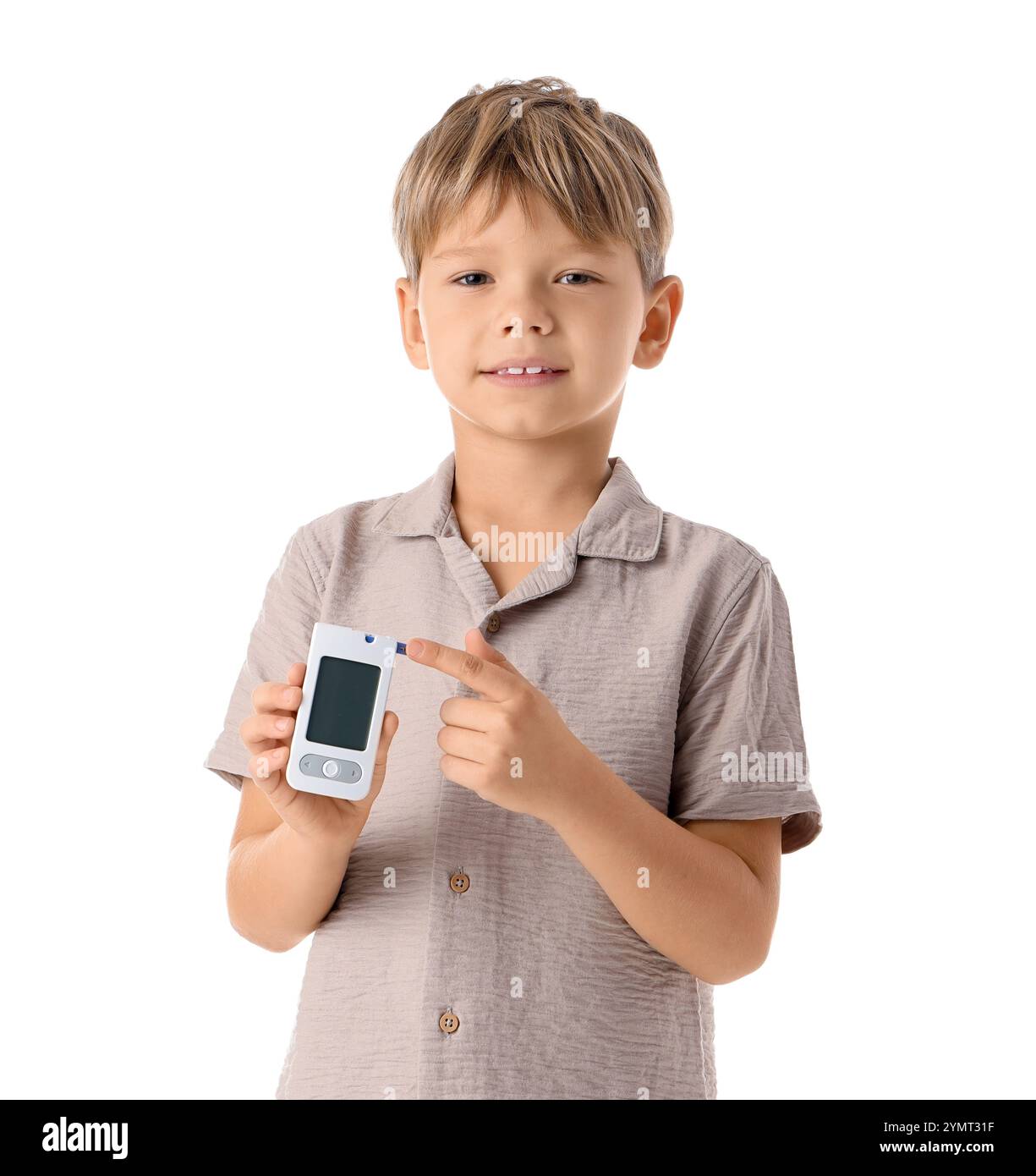 Little diabetic boy using glucometer on white background Stock Photo ...