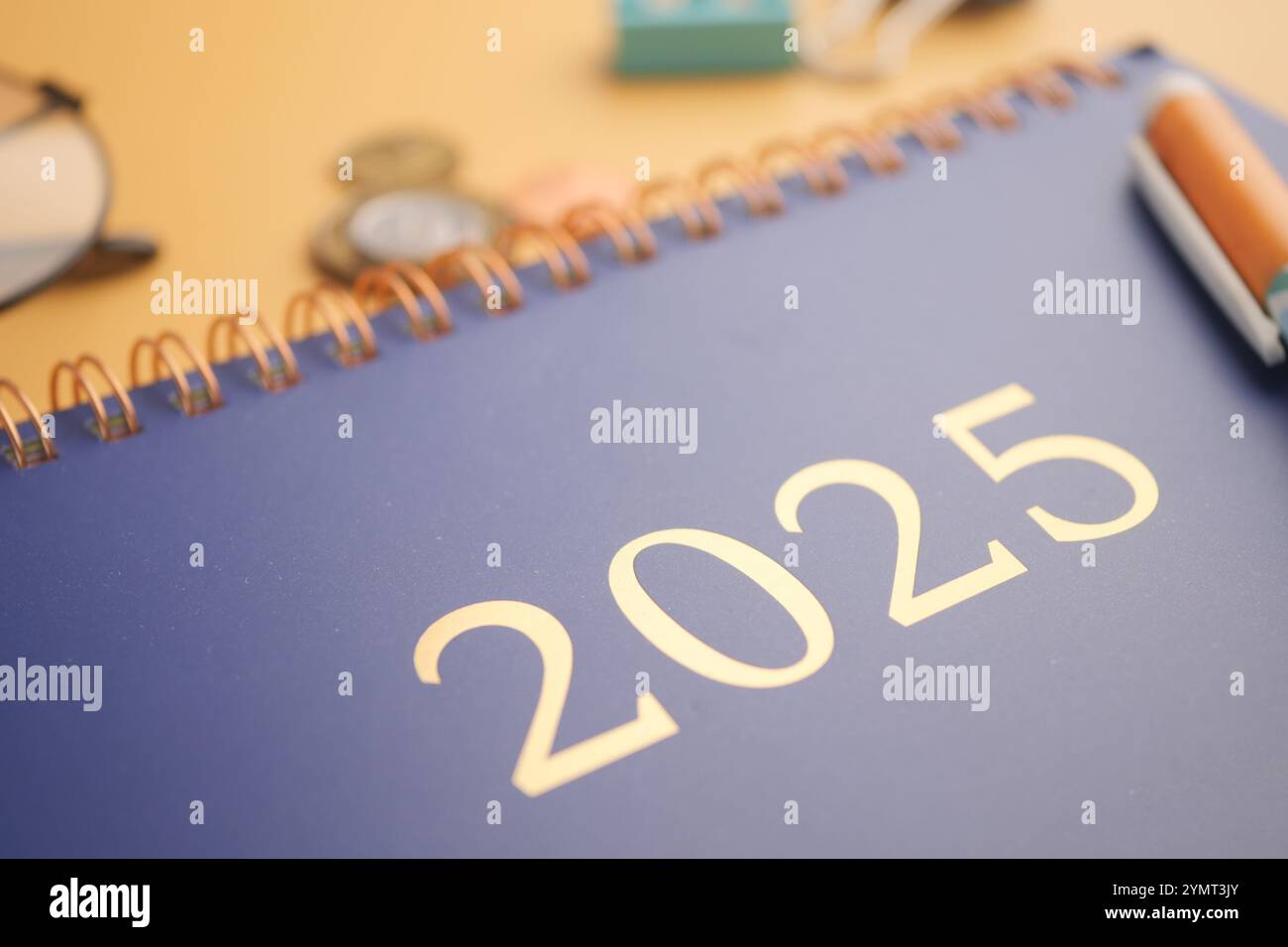 2025 year calendar on office desk Stock Photo - Alamy