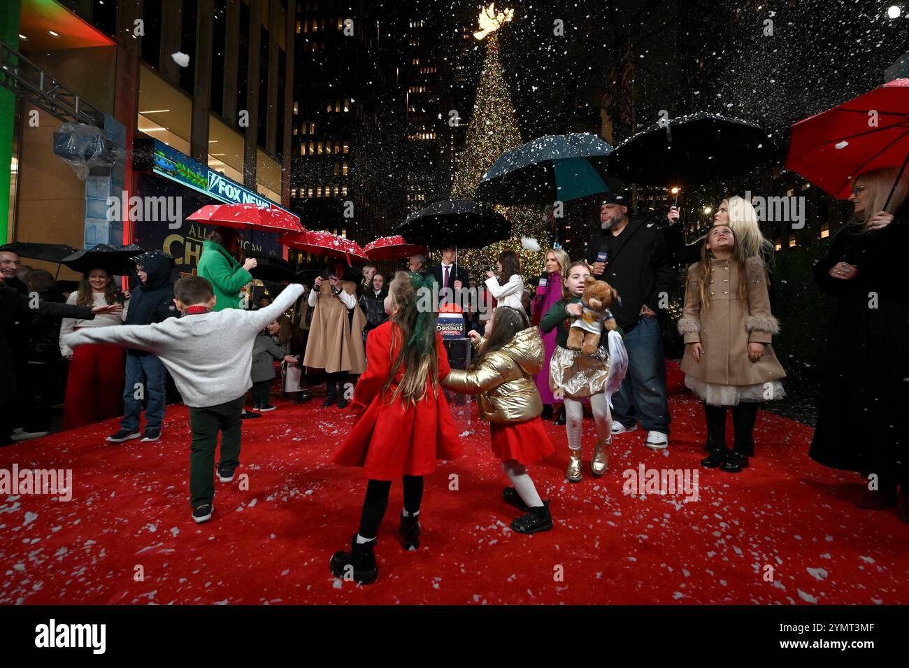 New York, USA. 22nd Nov, 2024. Fox News team members and their families ...
