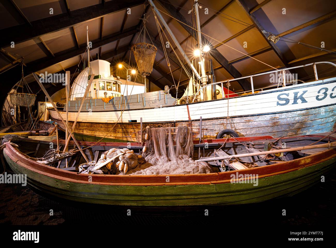Rowing fishing boat and Týr SK 33 fishing vessel. Boathouse, Herring ...