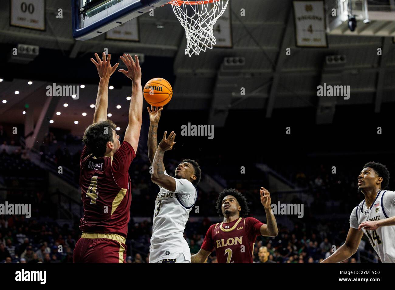 November 22, 2024: Notre Dame guard Markus Burton (3) goes up for a ...